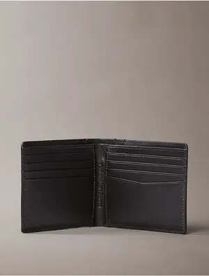 Calvin Klein Embossed Monogram Bifold Wallet