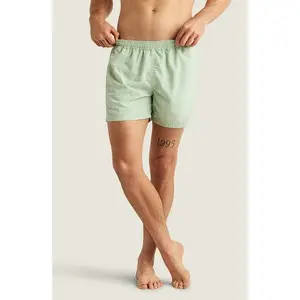 AUTO-REPLY™ Sebastian Solid 4-inch Nylon Swim Trunks - Overcast