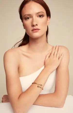 UNODE50 Rigid Bangle With Inner Spring - Gold