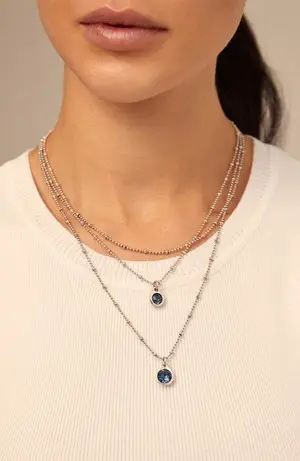 UNODE50 Sterling-plated Triple Pendant Necklace