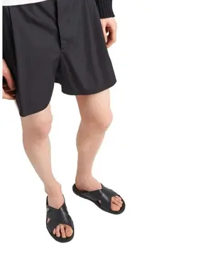 Prada Leather Crisscross Slides