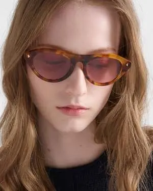 Prada Sunglasses With Metal Plaque