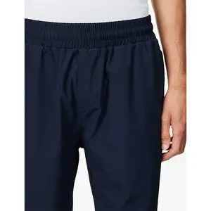 ARNE Active Technical Tapered-leg Stretch-woven Trousers - Navy