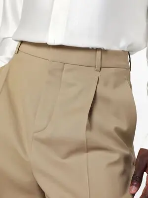 Saint Laurent Wool Carrot-fit Trousers - Beige