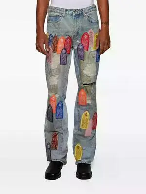 WHO DECIDES WAR Patch Arched Repaired Jeans