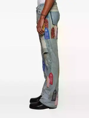 WHO DECIDES WAR Patch Arched Repaired Jeans