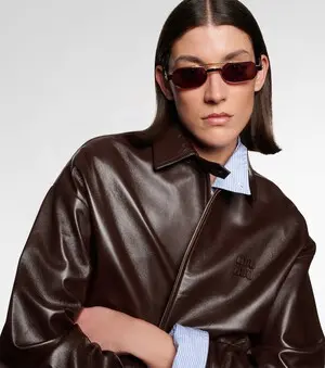 Miu Miu Oval Sunglasses - Pink