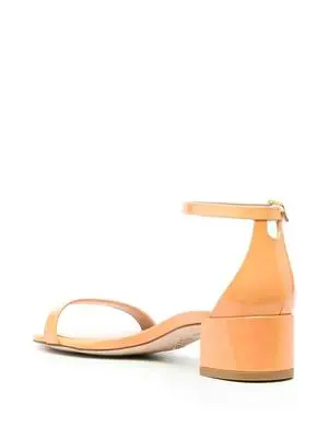 STUART WEITZMAN Nudist Curve Patent Sandals