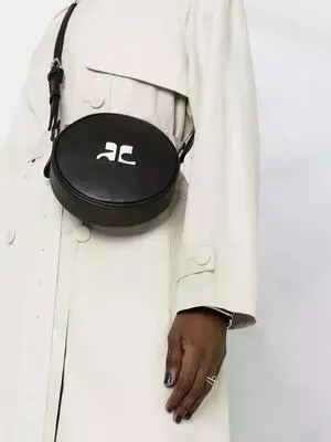 COURREGES Logo-embossed Rounded Crossbody Bag - Black