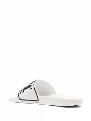 DIESEL® Logo Embossed Pool Slides