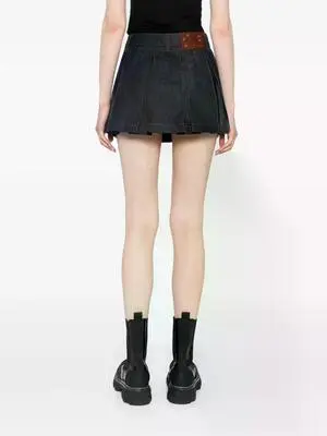 Andersson Bell Embroidered Panelled Pleated Denim Skirt