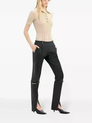COURREGES Iconic Ribbed-knit Polo Shirt