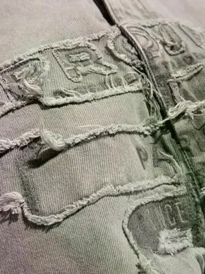 Y/project Wide Leg Jeans With Distressed Detailing