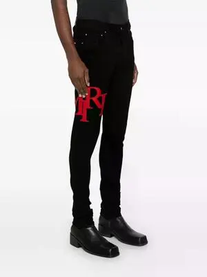 Amiri Staggered Logo Skinny Jeans