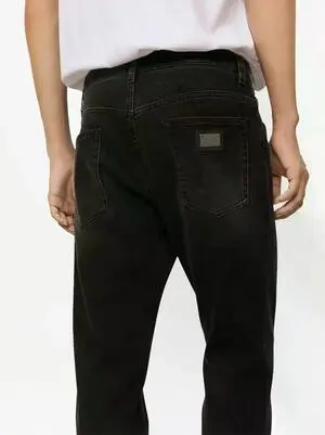Dolce & Gabbana Tapered-leg Jeans With Logo Appliqu - Black