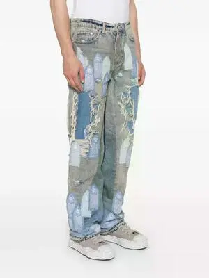 WHO DECIDES WAR Patched Arch Repaired Blowout Jeans - Denim