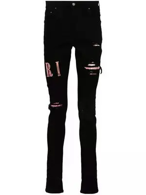 Amiri Waxed Logo-appliqué Skinny Jeans