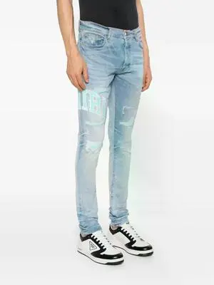 Amiri Varsity Logo Skinny Jeans