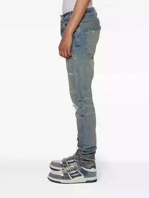 Amiri Appliqué Distressed Skinny Jeans