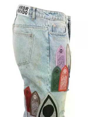 WHO DECIDES WAR Washed Denim Jeans