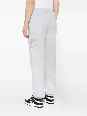 Amiri Staggered Logo-embroidered Track Pants