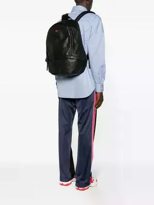 DIESEL® Logo-appliqué Backpack - Black
