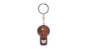 A BATHING APE Baby Milo Kokeshi Doll Keychain - Brown