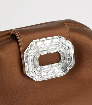Amina Muaddi Satin Camelia Clutch Bag With Embellished Clasp And Chain Strap
