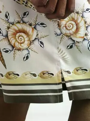Dolce & Gabbana Silk Printed Bermuda Shorts - Neutrals