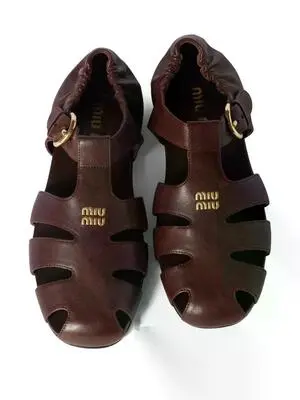 Miu Miu Cage-style Buckled Flat Pumps