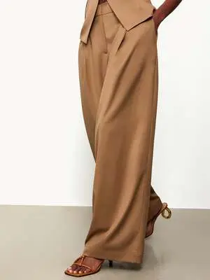 SLOAN The Wide-leg Pleated Trousers