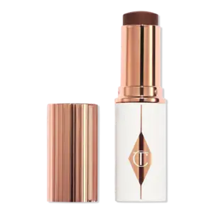 Charlotte Tilbury Unreal Skin Sheer Glow Tint Hydrating Foundation Stick - 16 Deep
