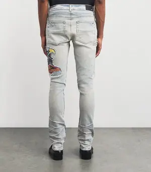 Amiri Distressed Cement Thrasher Skinny Jeans