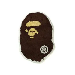 A BATHING APE Ape Head Rug Mat - Brown