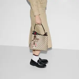 Gucci Gg Emblem Medium Bucket Bag Gg Canvas - Beige