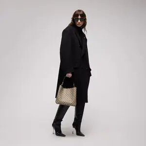 Gucci Gg Emblem Medium Bucket Bag Gg Canvas - Beige