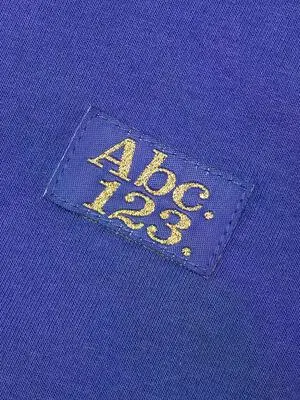 ADVISORY BOARD CRYSTALS Logo-patch Trousers - Blue