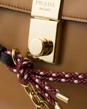 Prada Large Leather Shoulder Bag With Charms - Brown