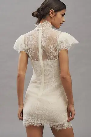 De La Vali Silentium Lace Mini Dress With Flounce Sleeves - White |  Editorialist