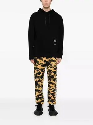 MASTERMIND WORLD Graphic-print Trousers