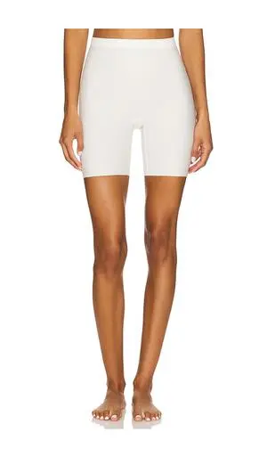 Spanx Spanx Shape Invisible Supima Cotton Mid Thigh Short In Cream. Powder