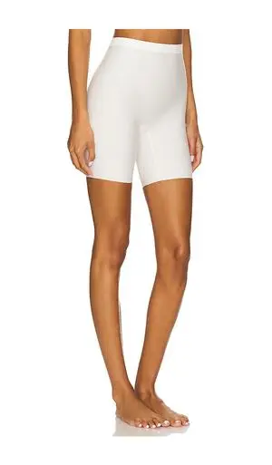 Spanx Shape Invisible Supima Cotton Mid Thigh Short In Cream - Powder