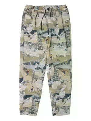 YOSHIOKUBO Graphic-print Trousers - Green