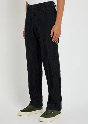Stone Island Crinkled Tapered-leg Corduroy Trousers - Navy