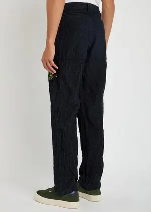 Stone Island Crinkled Tapered-leg Corduroy Trousers - Navy