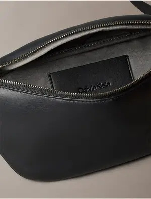 Calvin Klein Embossed Monogram Belt Bag