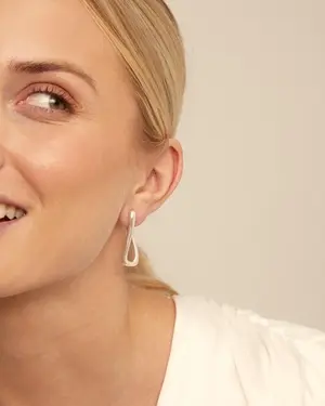 UNODE50 Wave Hoop Earrings - Silver