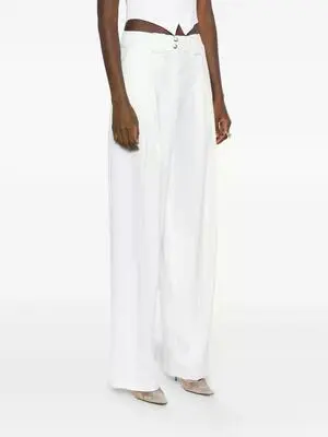 VESTIAIRE D'UN OISEAU LIBRE Pleated-front Trousers