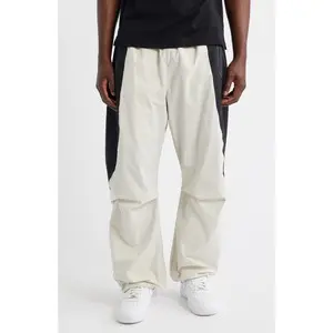 Nike Tech Dri-fit Woven Oversize Stretch Nylon Pants - Light Bone/black
