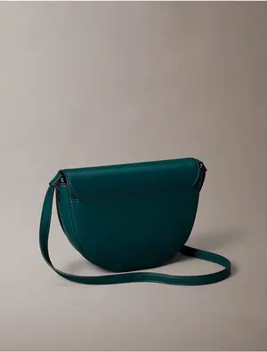 Calvin Klein Embossed Monogram Saddle Bag - Maya Blue